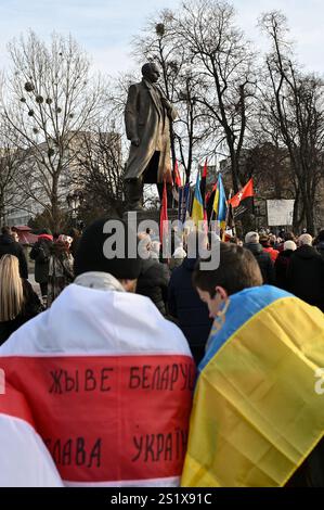 LVIV, UKRAINE - JANUARY 1, 2025 - People walk from the Stepan Bandera ...