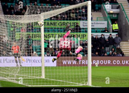 Rangers' Hamza Igamane scores their side's third goal of the game ...