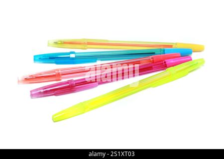 Close up of colorful gel pens arranged in rainbow palette order inside ...