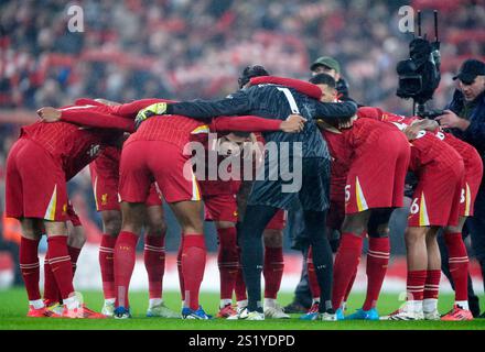 Liverpool players huddle ahead of the Premier League match at the Gtech ...