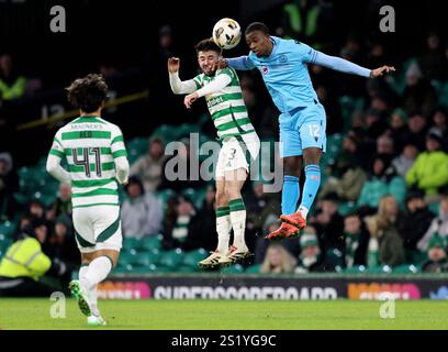 St Mirren's Roland Idowu (right) and team-mate warming up prior to kick ...
