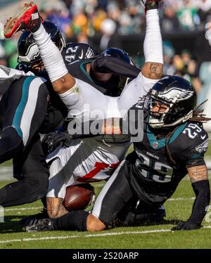 Philadelphia Eagles cornerback Kelee Ringo (7) tackles Detroit Lions ...