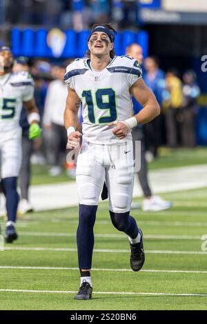 Seattle Seahawks wide receiver Jake Bobo (19) leaves the field after ...