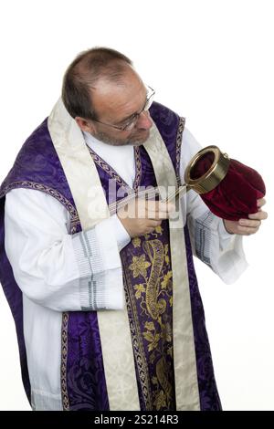 A Catholic priest collects money for the Church of Austria Stock Photo ...