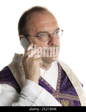 catholic priest with mobile phone Stock Photo - Alamy