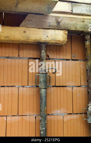 A detached house is built in solid construction with bricks. Thermal ...