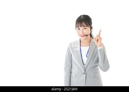 Call centre woman pointing fingers Stock Photo - Alamy