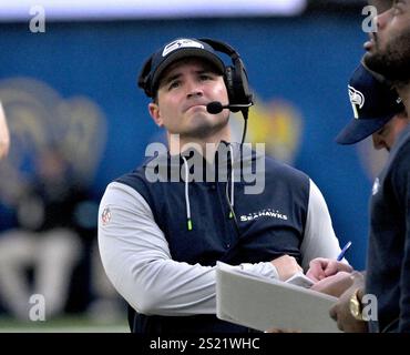 Seattle Seahawks head coach Mike Macdonald walks on the field after an ...