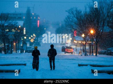 Pedestrians walk toward Kirkwood at the Sample Gates during a major ...