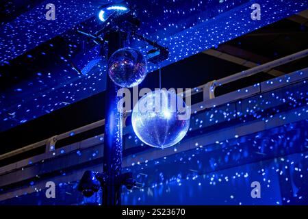 Disco ball, reflective light nightclub rave party clubbing nightlife ...