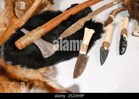 Stone Age Tools with Knives and Animal Fur Stock Photo - Alamy