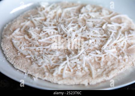 Traditional Brazilian tapioca with coconut served on a banana leaf ...