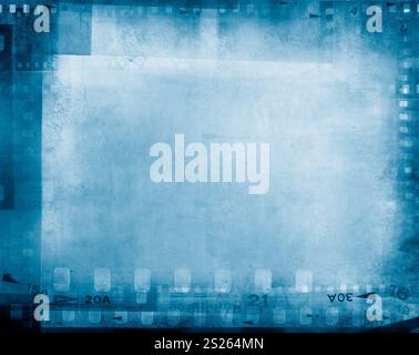 Film negatives frames blue background Stock Photo - Alamy