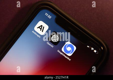 Anthropic, OpenAI and Google DeepMind icons are displayed on an iPhone ...