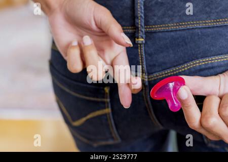 Condoms with nude woman Stock Photo - Alamy
