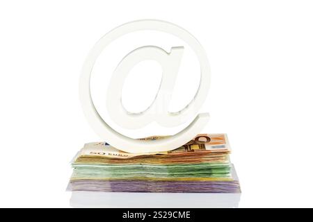 Spider monkey and banknotes Stock Photo - Alamy