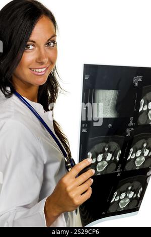 A doctor holds the X-ray image of an intervertebral disc infiltration ...