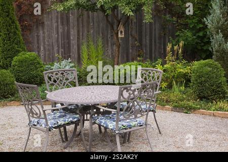 Wooden fence and round-shaped stones in the background of the peaceful ...