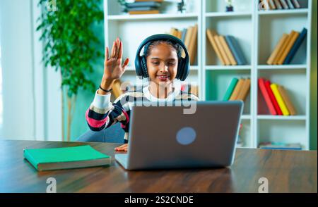 Studious Indian Asian Elementary Grade Girl Attending Virtual Online ...