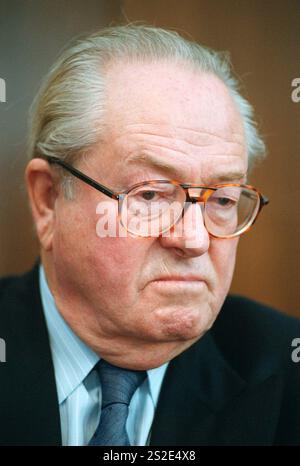 FILE - French far-right leader Marine Le Pen, center, greets people as ...