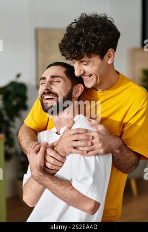 Two men sharing a heartfelt embrace Stock Photo - Alamy