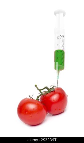 Gmo product concept: Tomato injection isolated Stock Photo - Alamy