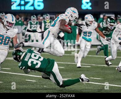 New York Jets' Jarius Monroe stops Green Bay Packers' Cornelius Johnson ...