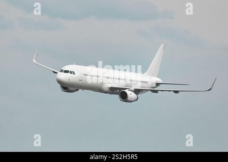 Passenger Aircraft Mid-air, Plain White Airplane Stock Photo - Alamy