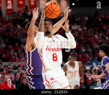Houston guard Mylik Wilson (8) defends against West Virginia guard ...