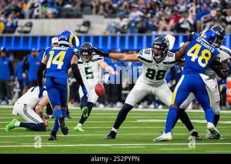 Seattle Seahawks kicker Jason Myers (5) follows through on his kick ...