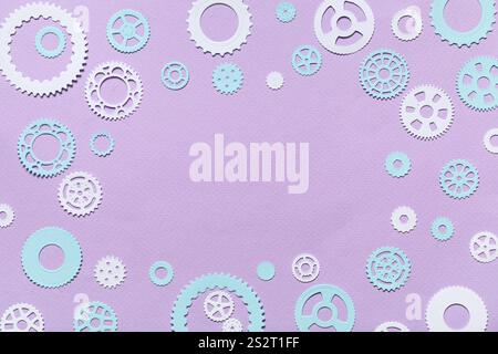 Different paper gears on lilac background Stock Photo - Alamy