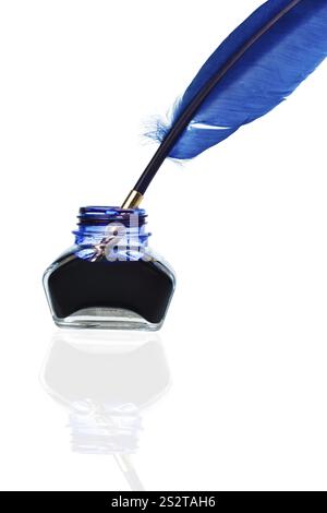 A blue quill with an inkwell on a white background Austria Stock Photo ...