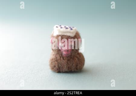 Felt Monkey And Blue Background Stock Photo - Alamy