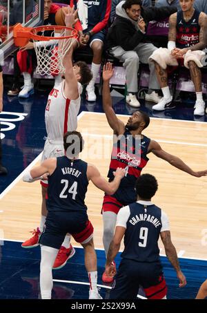 Houston Rockets center Alperen Sengun (28) dunks during the second half ...