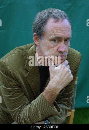 Actor, comic and writer Nigel Planer and his wife arrive for the ...