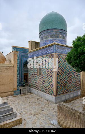 Mausoleum with a dome, Arabic script and traditional Uzbek ornament in ...