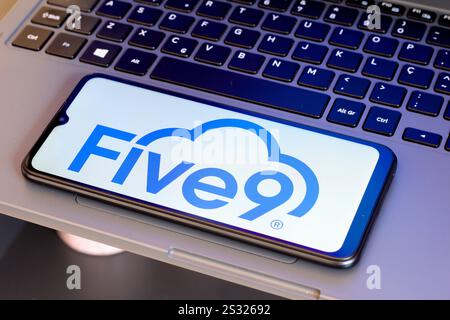 In this photo illustration, the Five9 Inc. logo is displayed on a ...