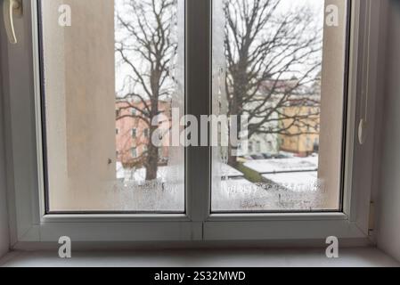 Steamy window in the apartment due to moisture and poor ventilation ...