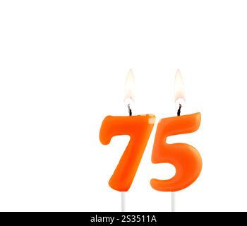 Candle number 75 - Lit birthday candle on white background Stock Photo ...