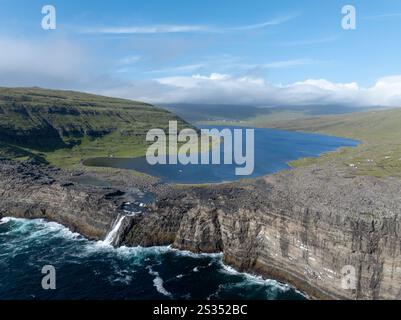 Bosdalafossur waterfall, that falls directly into the ocean ...