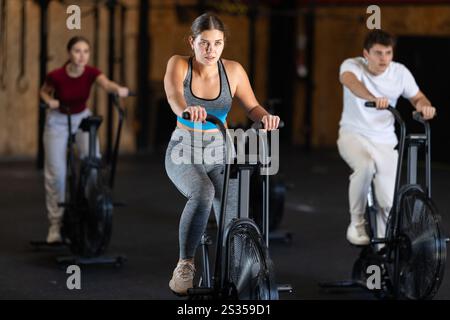 Woman in the top is engaged in an airbike Stock Photo - Alamy