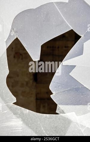 A broken window pane on a patio door Austria Stock Photo - Alamy