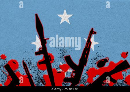 Micronesia flag and various weapons in red blood. Concept for terror ...