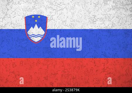 Slovenia flag depicted in bright paint colors on old relief plastering ...