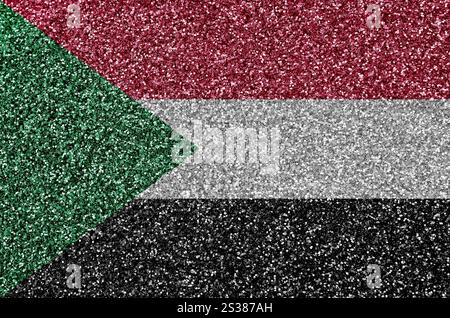 Sudan flag depicted on many small shiny sequins. Colorful festival ...