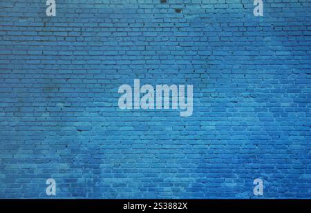The texture of the brick wall of many rows of bricks painted in yellow ...