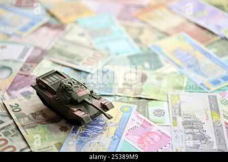Green Plastic Tank Toy on dark background Stock Photo - Alamy