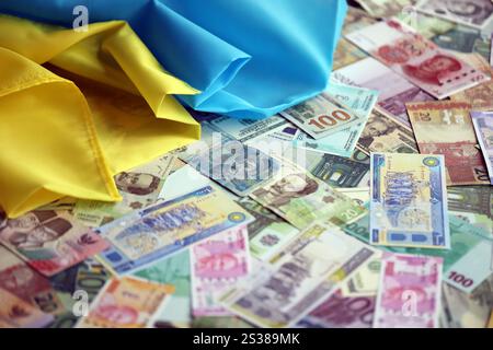 Dollars on flag of Ukraine, Ukrainian finance, subsidies, social ...