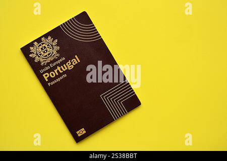 Red Portugal passport of European Union on national flag background ...