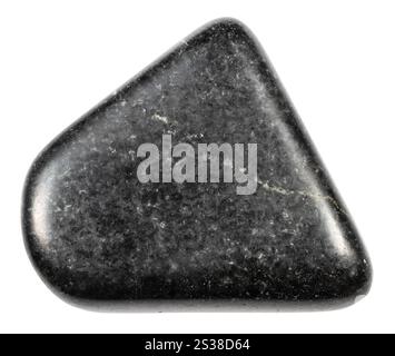 sample of tumbled dolerite rock on black granite background close up ...